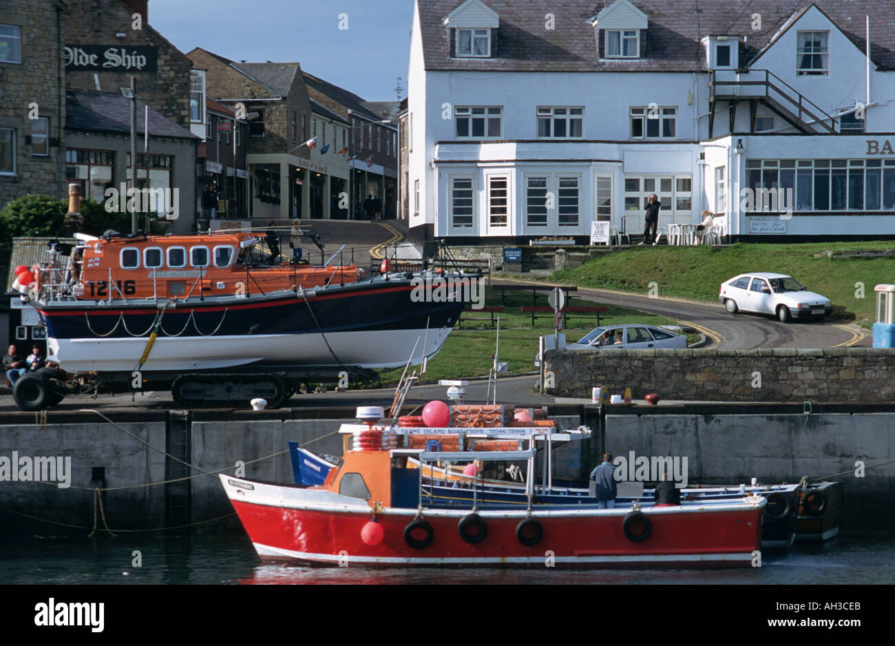 "Grace Darling" lifeboat at Seahouses moving along the harbour frontage ...