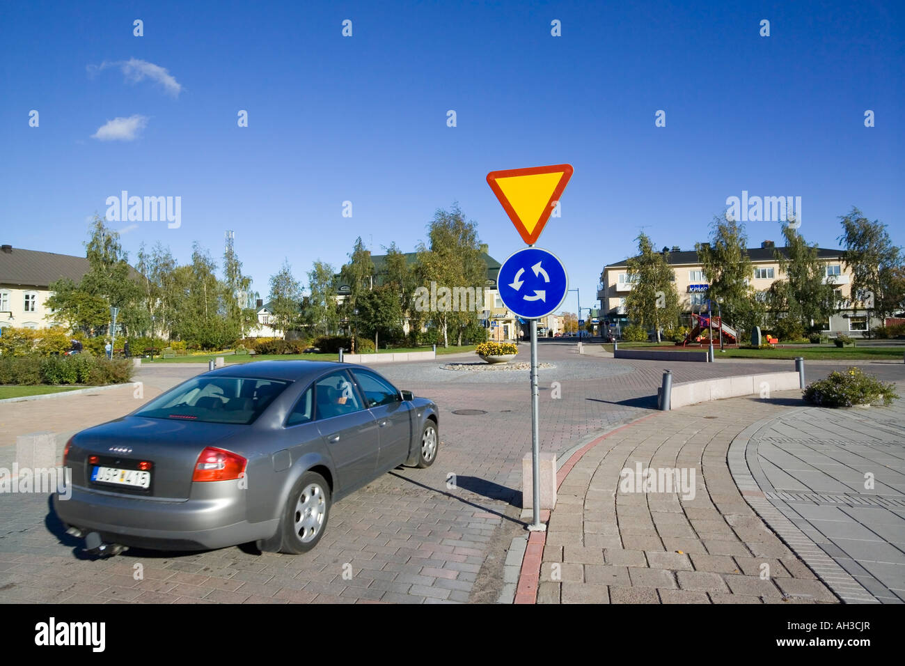 compulsory roundabout traffic sign Haparanda Sweden Stock Photo - Alamy