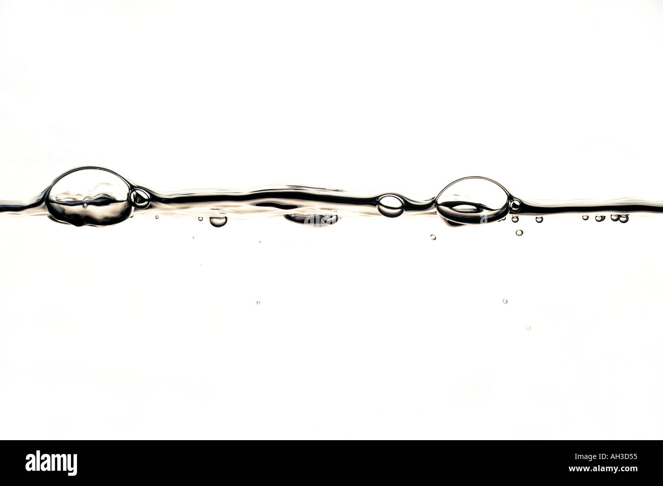 a line of bubbles in water Stock Photo - Alamy