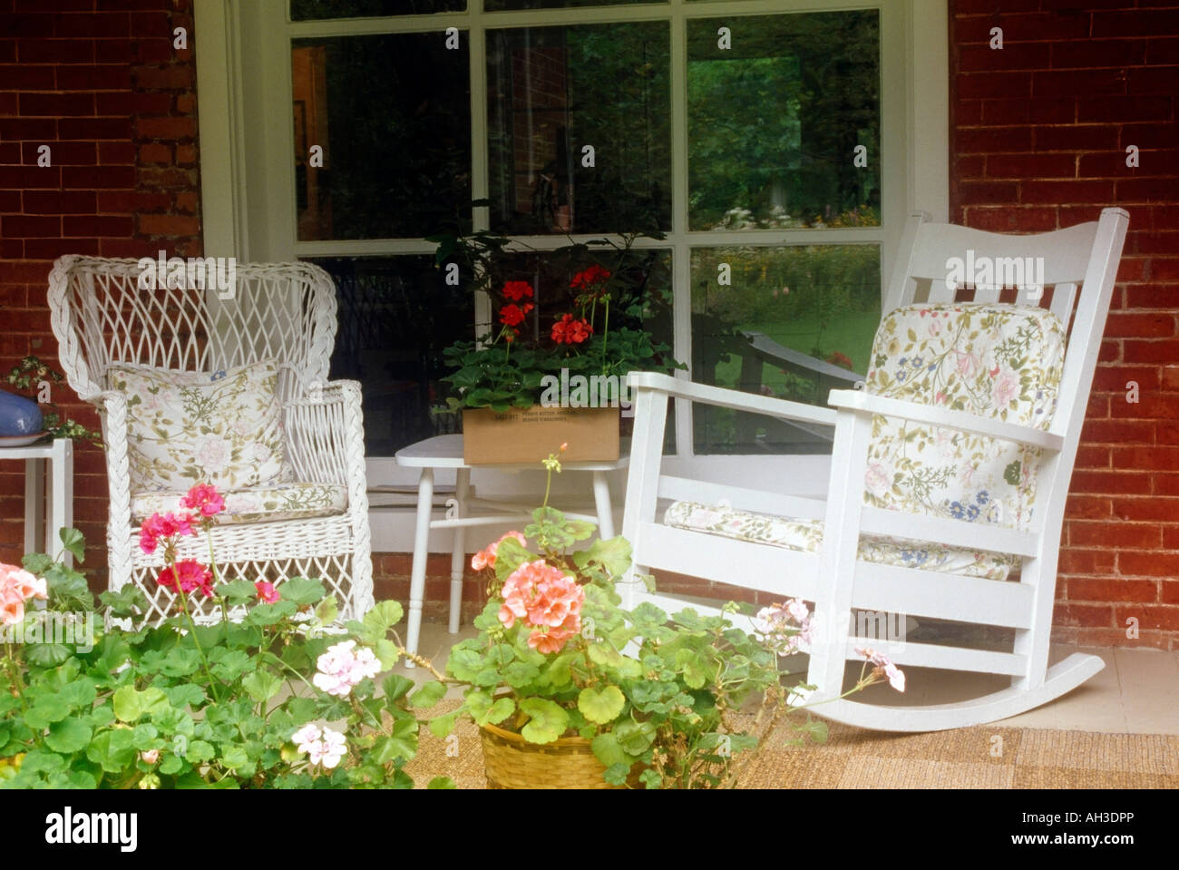 Rocking chairs on country porch Stock Photo - Alamy