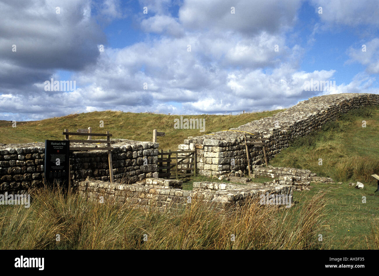 Knag burn Gate house on Hadrians Wall with blue sky and clouds behind ...
