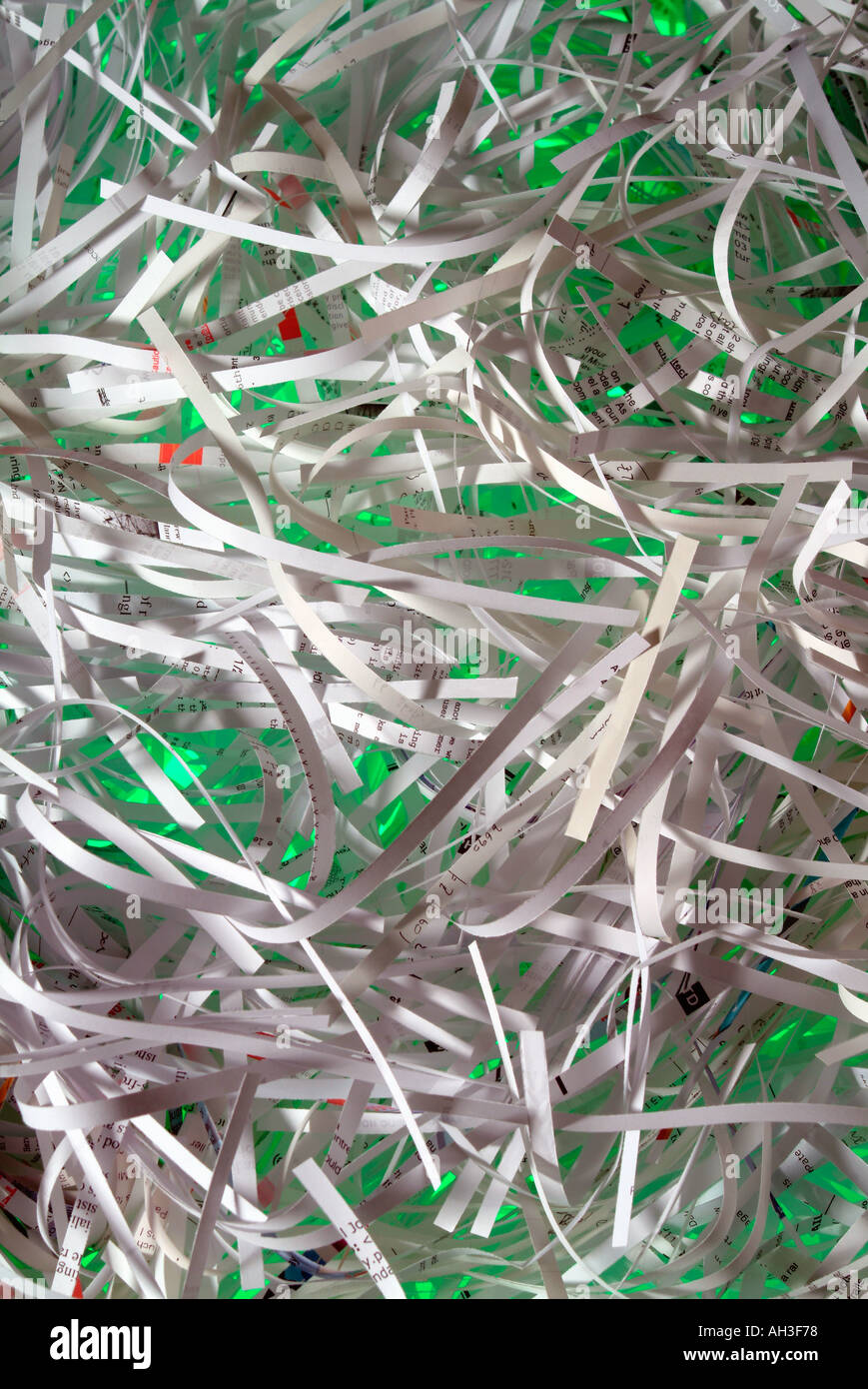 Shredded paper green background Stock Photo - Alamy