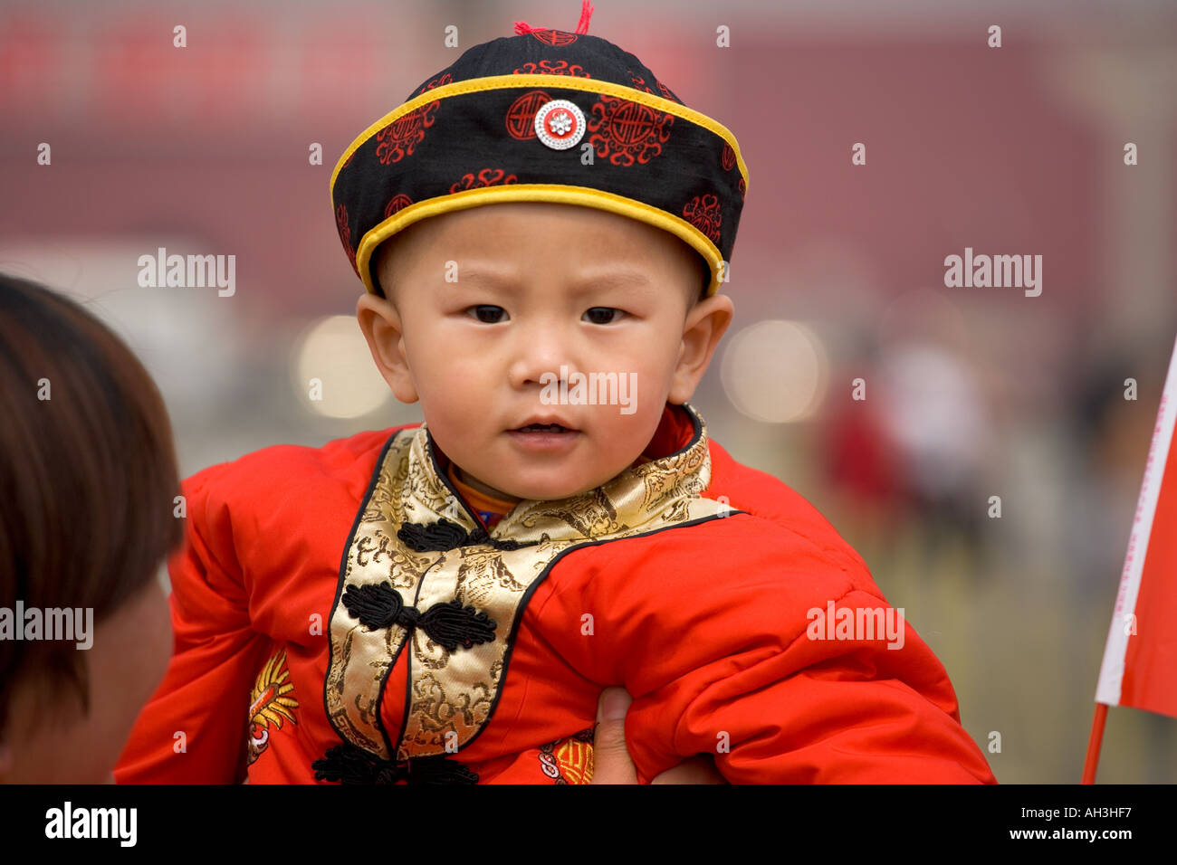Chinese boy wearing traditional costume hi-res stock photography and ...