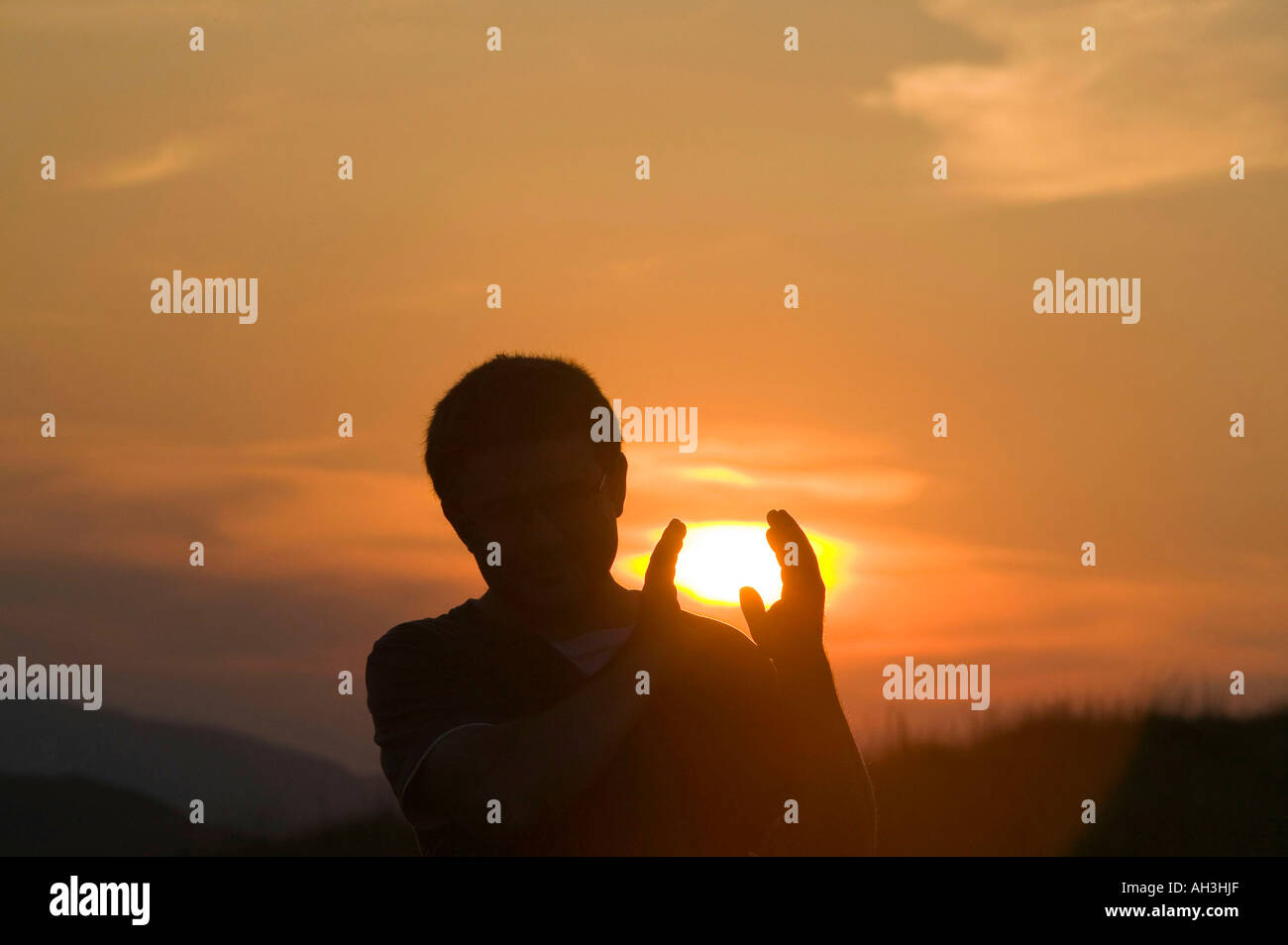 a man holding the setting sun up on his shoulders, Helvellyn, Lake ...