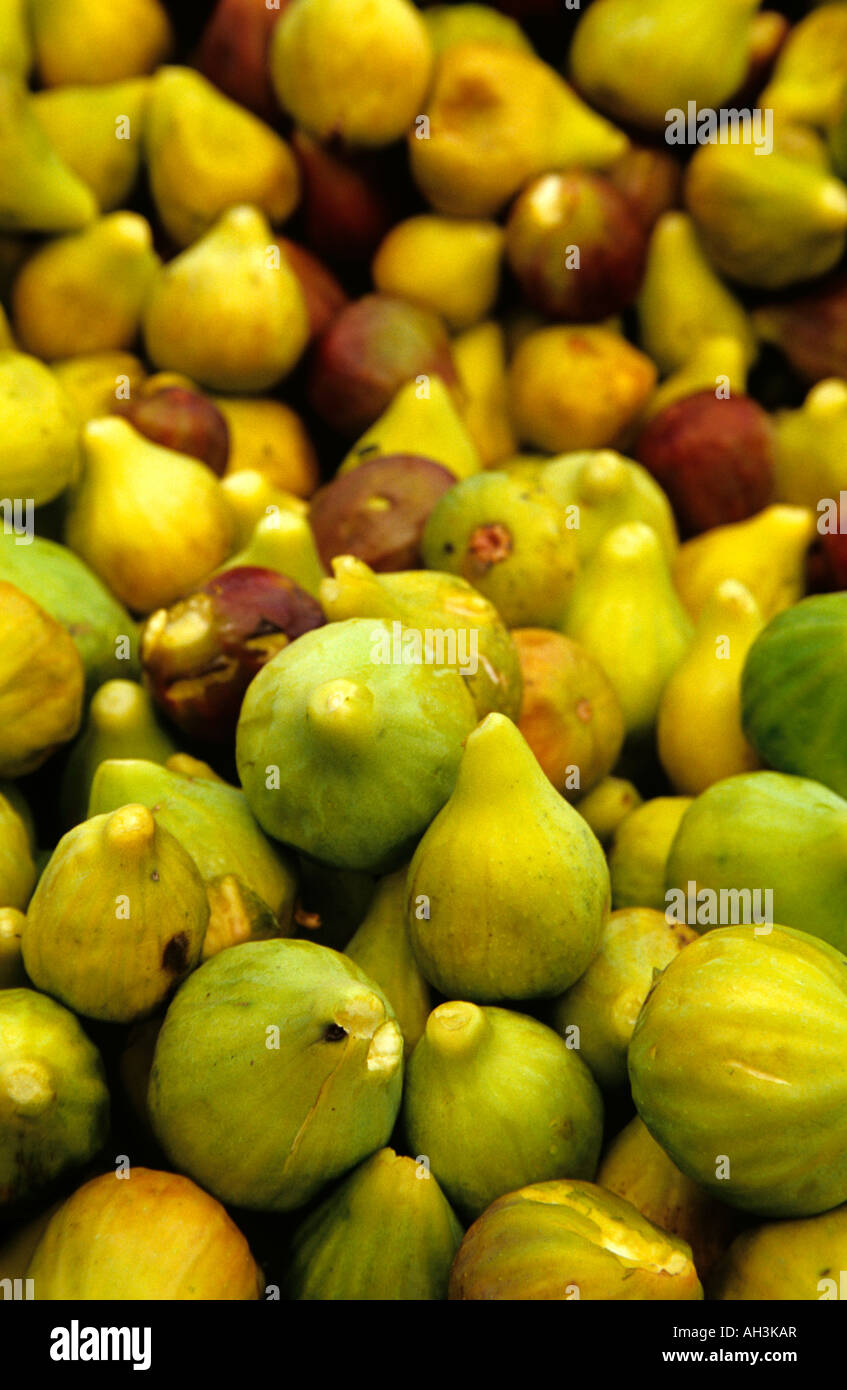 Fresh green and purple figs piled at a market in Chefchaouen, Morocco ...