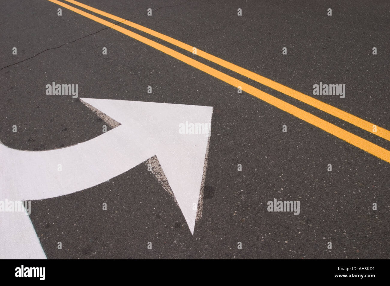 Directional arrows on a city street Stock Photo - Alamy