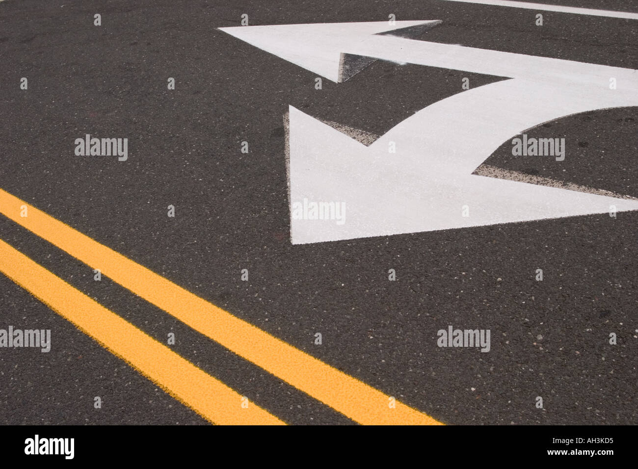 Directional arrows on a city street Stock Photo - Alamy