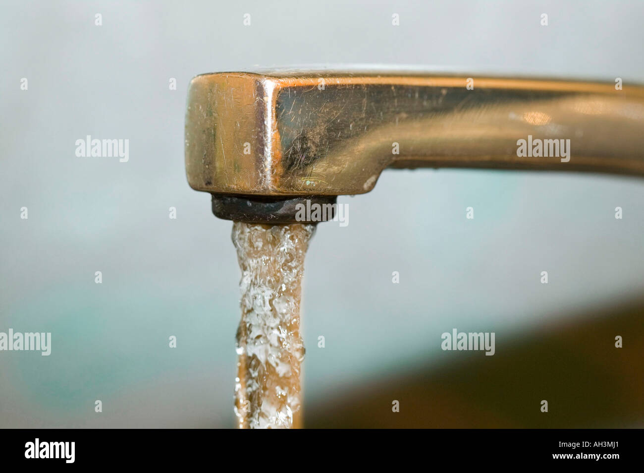 a flowing tap Stock Photo - Alamy