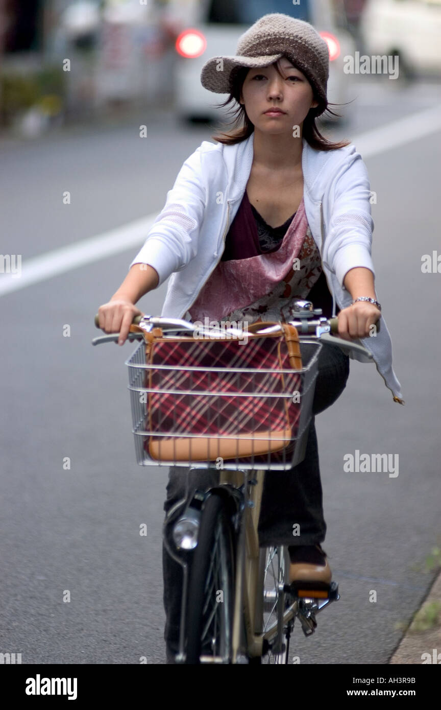 Japanese girl on bicycle hi-res stock photography and images - Alamy