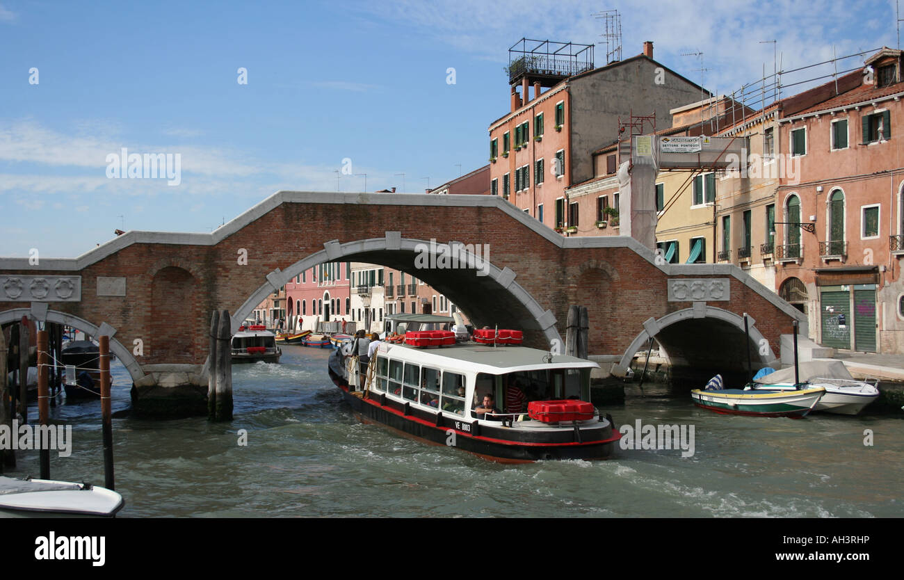 vaporetti and Ponte dei Tre Archi bridge of three arches over ...