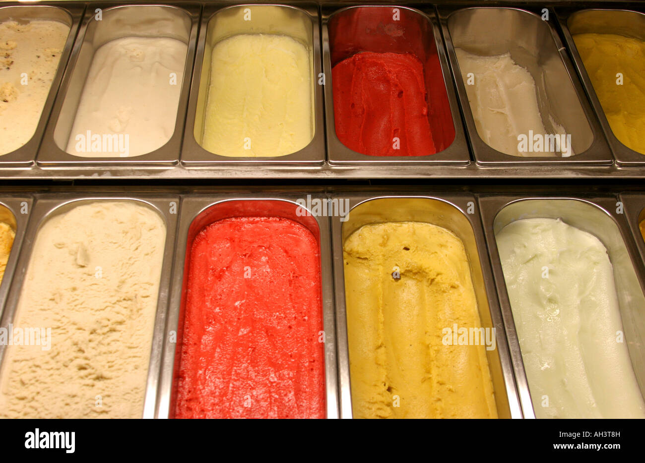 Multiple flavors of ice cream on display at an ice cream shop Stock ...