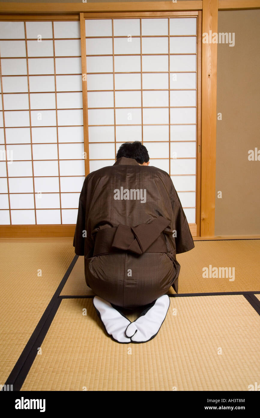 Man bowing, rear View Stock Photo - Alamy
