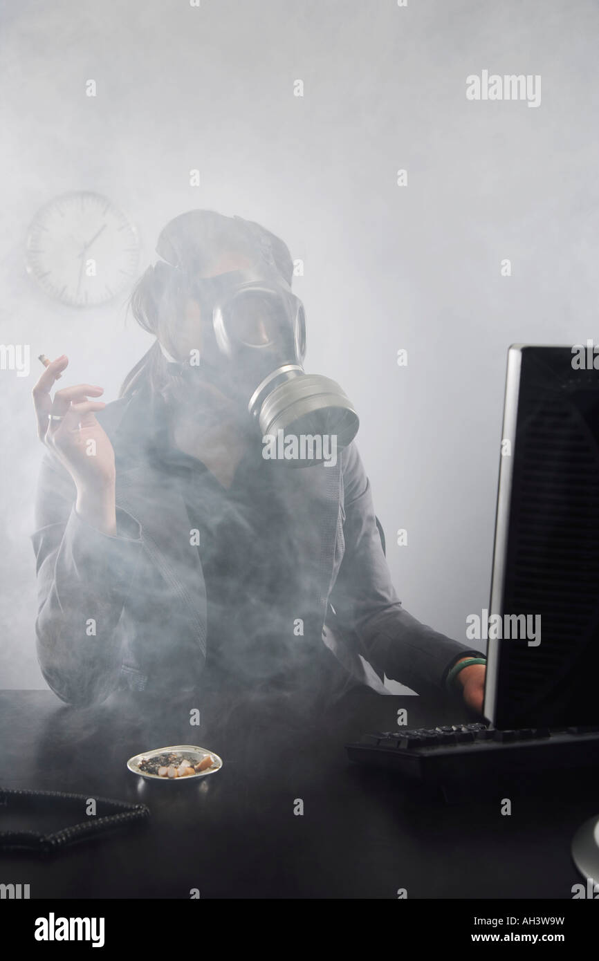 Woman smoking with gas mask Stock Photo - Alamy