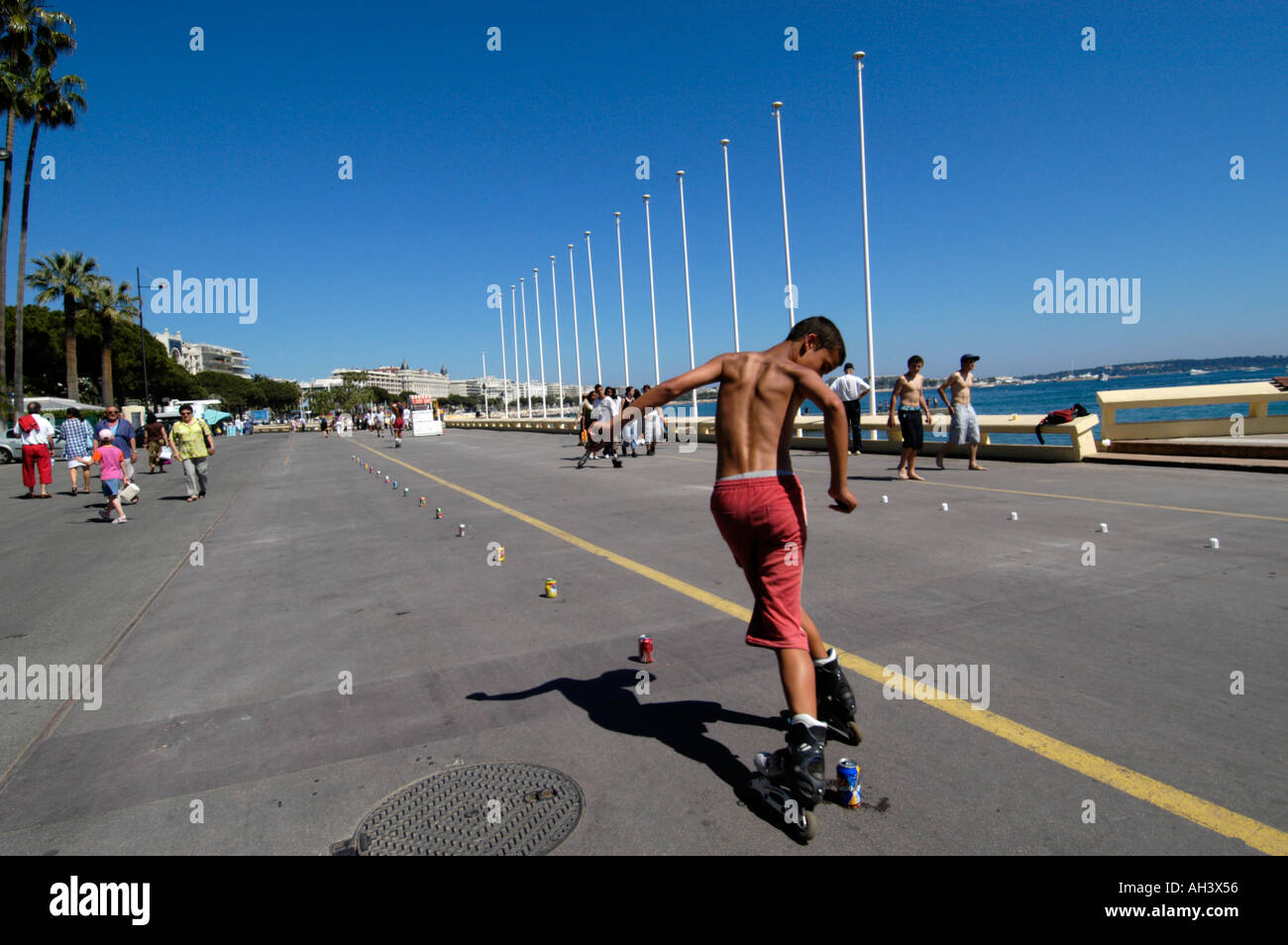 Roller blading on La Croisette beach Cannes France Stock Photo - Alamy