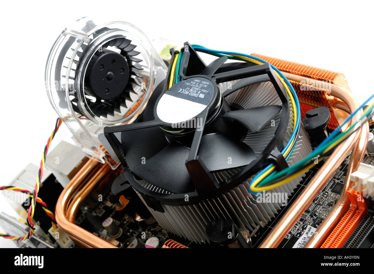 CPU cooler fan with radiator on a high-end computer motherboard Stock ...
