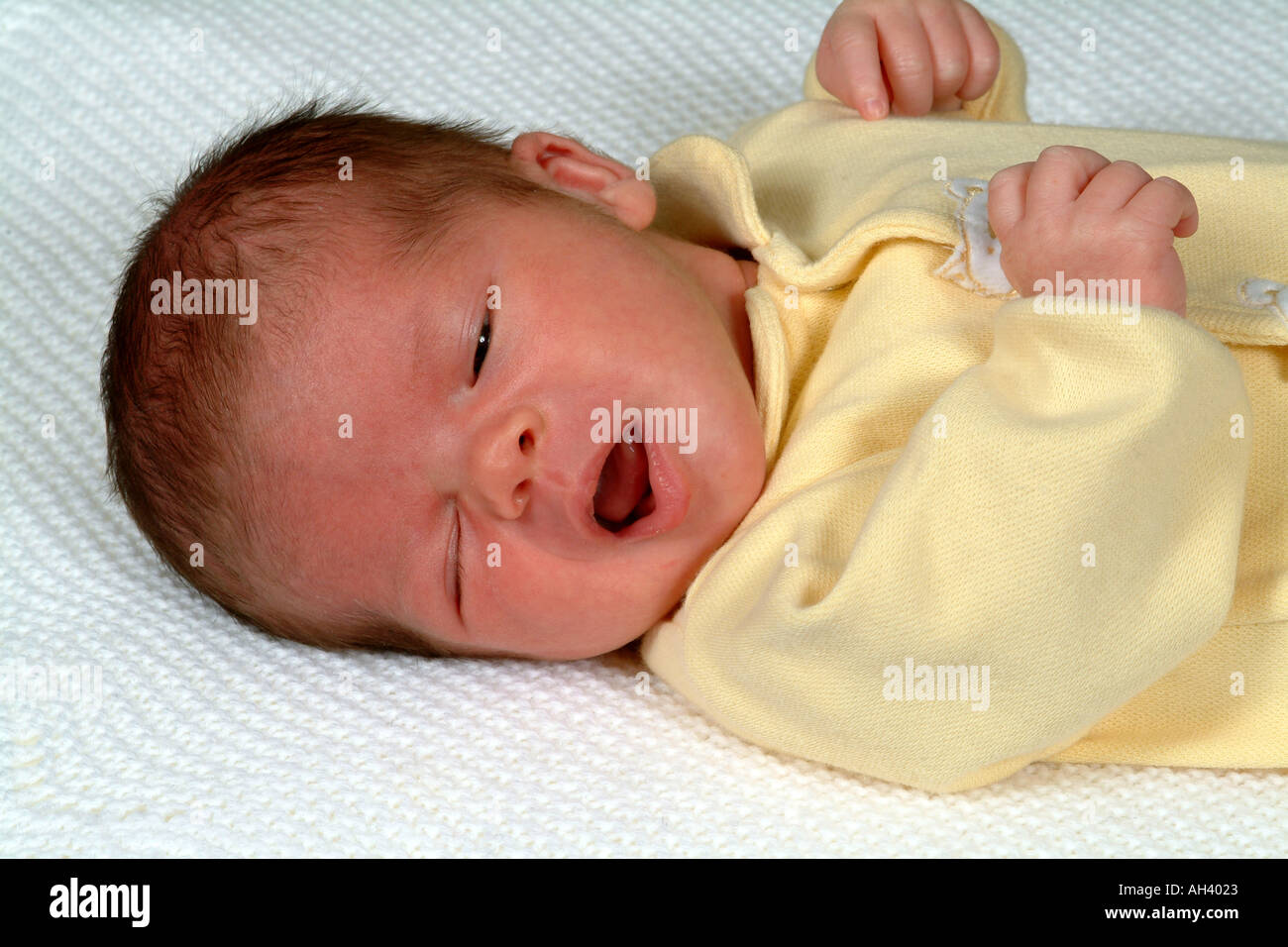 Yawning Baby Girl at Four Weeks Old Stock Photo - Alamy