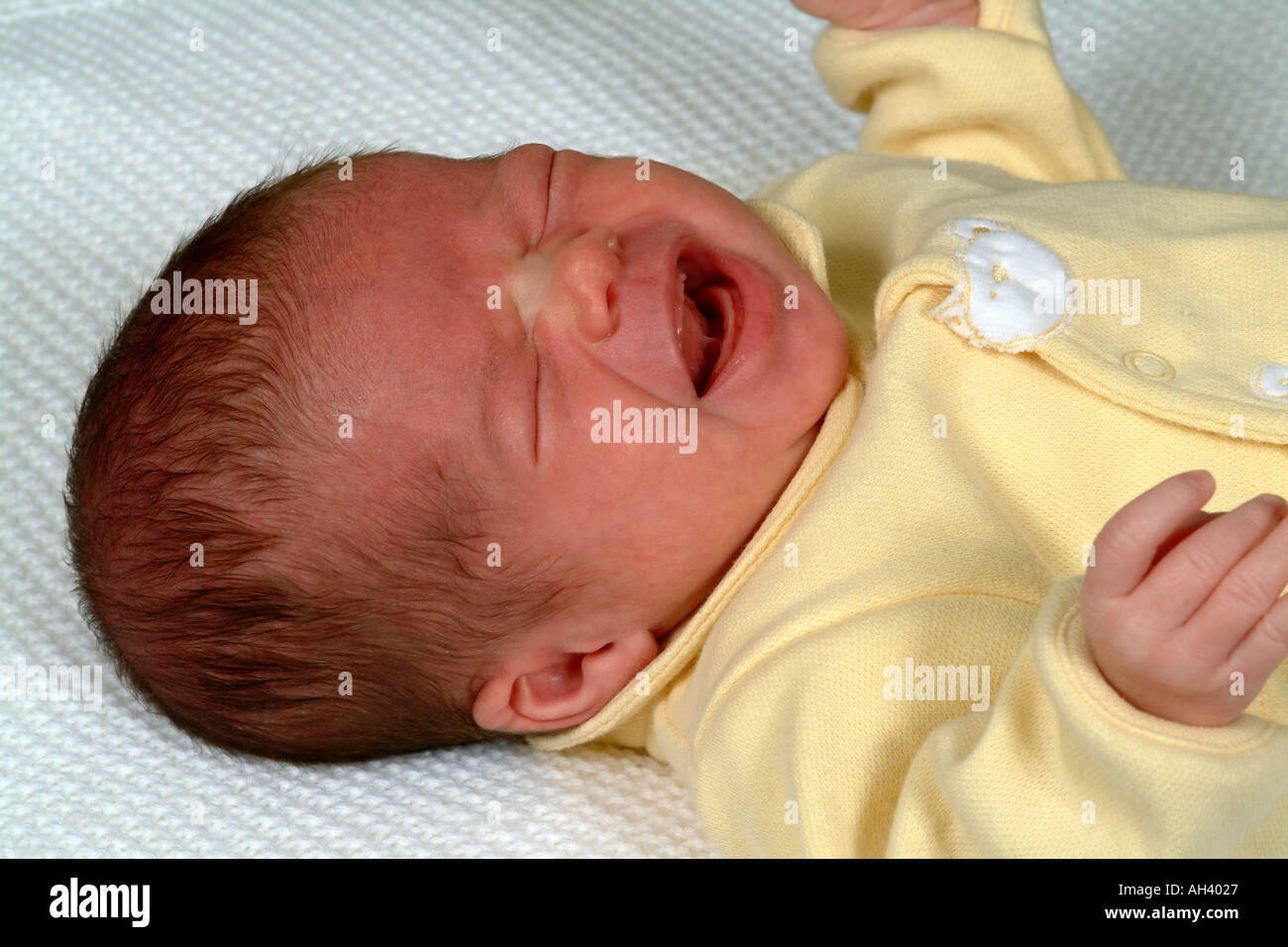 Crying Baby Girl Four Weeks Old Stock Photo - Alamy