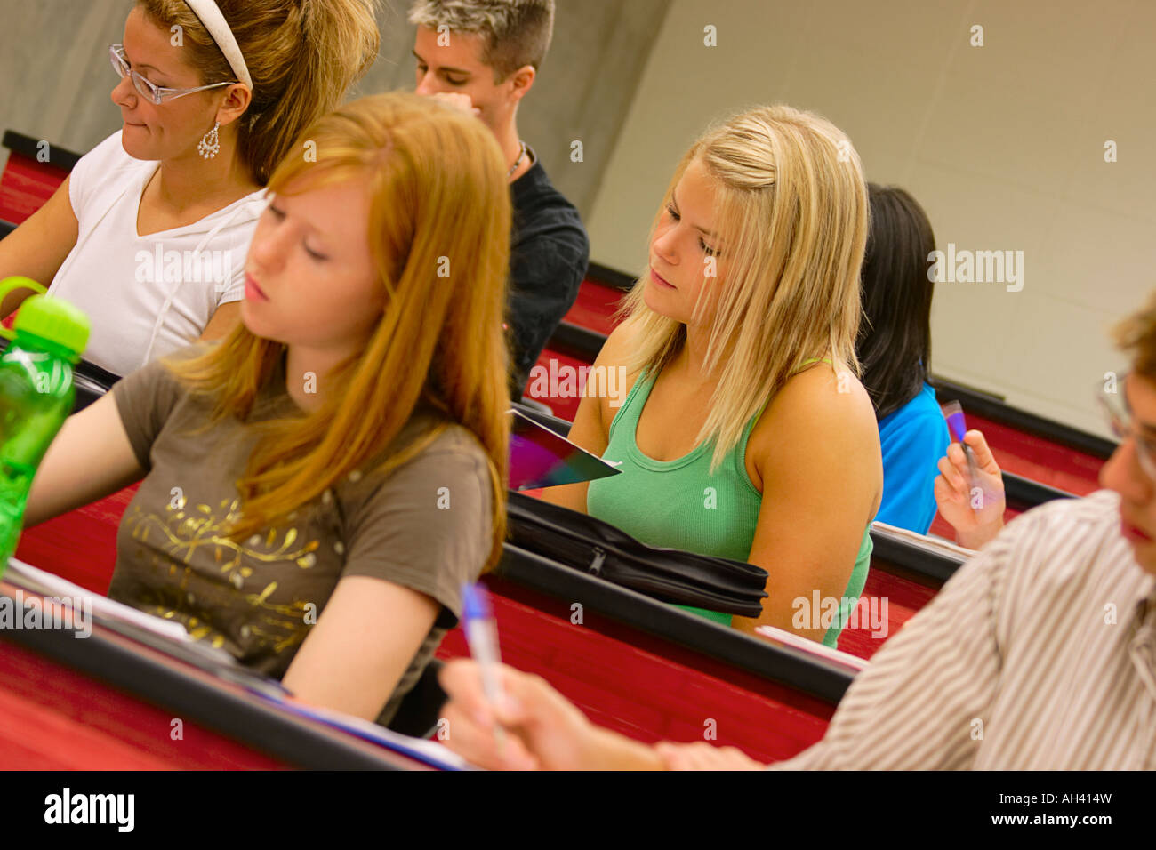 Students working in classroom Stock Photo - Alamy