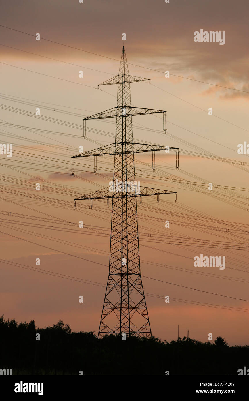 Electricity pylon at dusk in German country side Stock Photo - Alamy