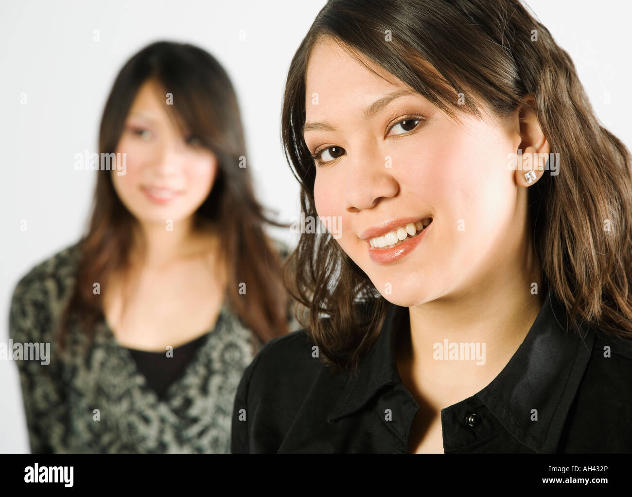 Two Women Smiling Stock Photo - Alamy