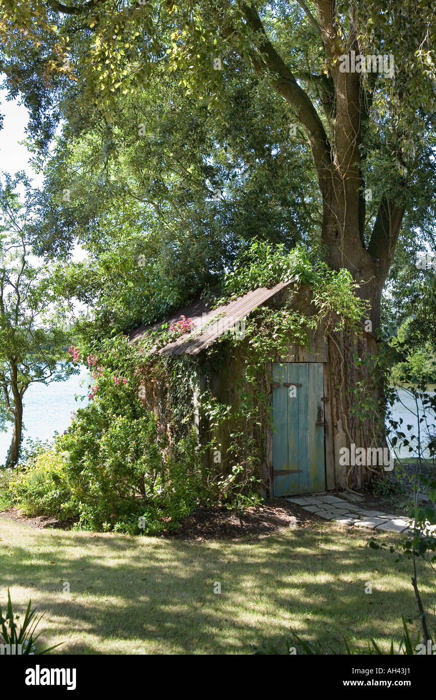 Secret hidden garden shed Stock Photo - Alamy