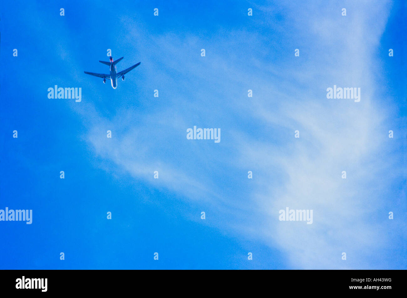 Commercial Airliner flying at altitude Stock Photo - Alamy