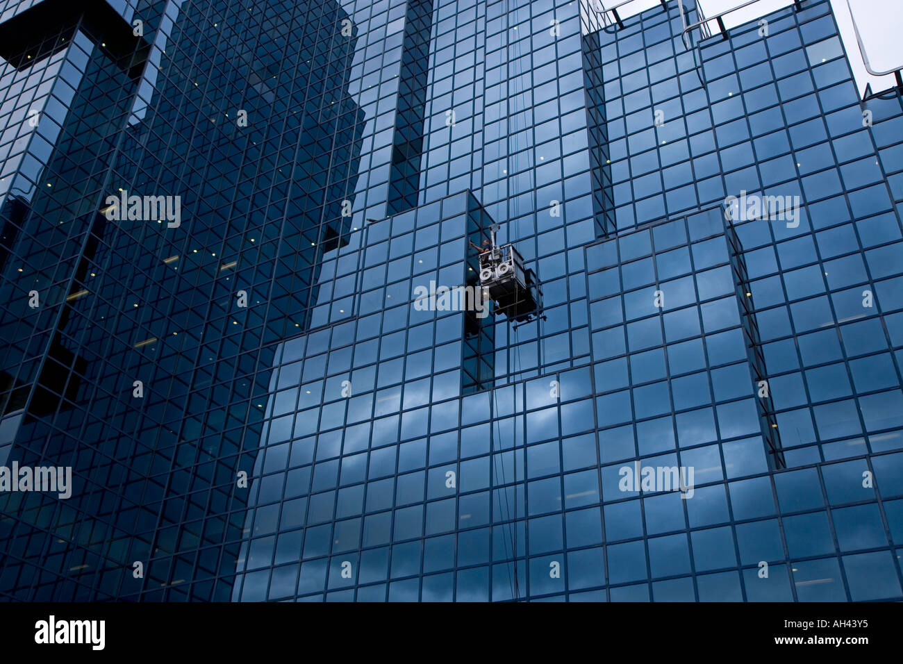 Cleaning Windows on Tower Block London UK Summer Stock Photo - Alamy
