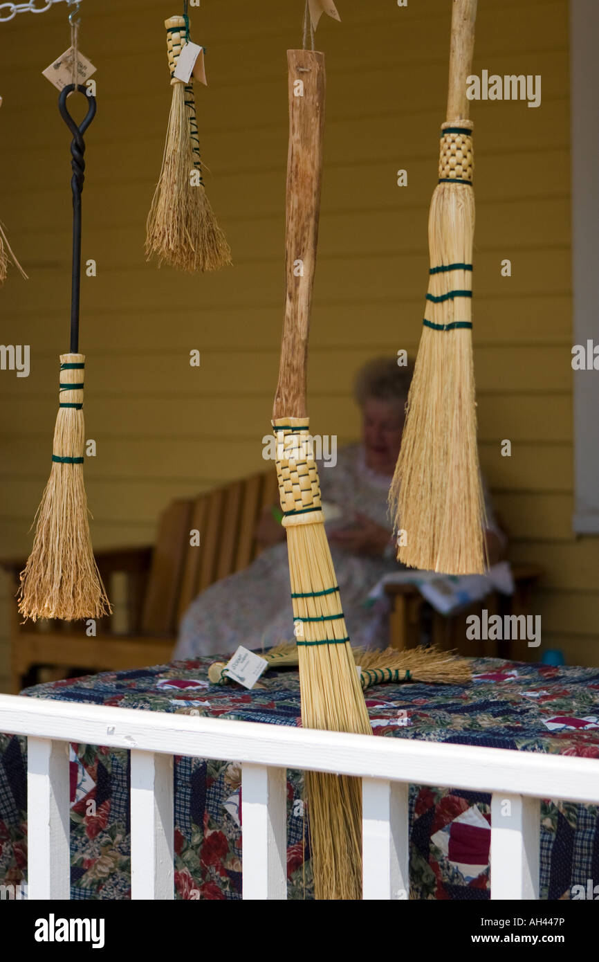 Female Brush Maker on Porch Stock Photo - Alamy