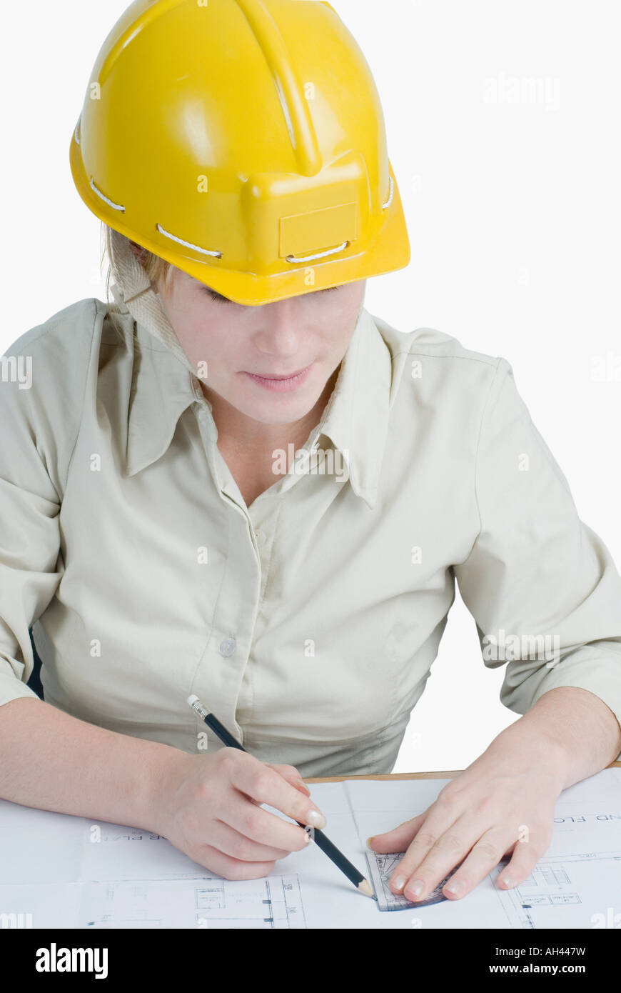 Close-up of an architect drawing blueprints Stock Photo - Alamy