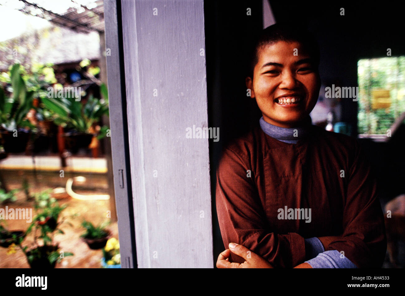 Young female Buddhist monk at a female only monastery in Hue Vietnam ...
