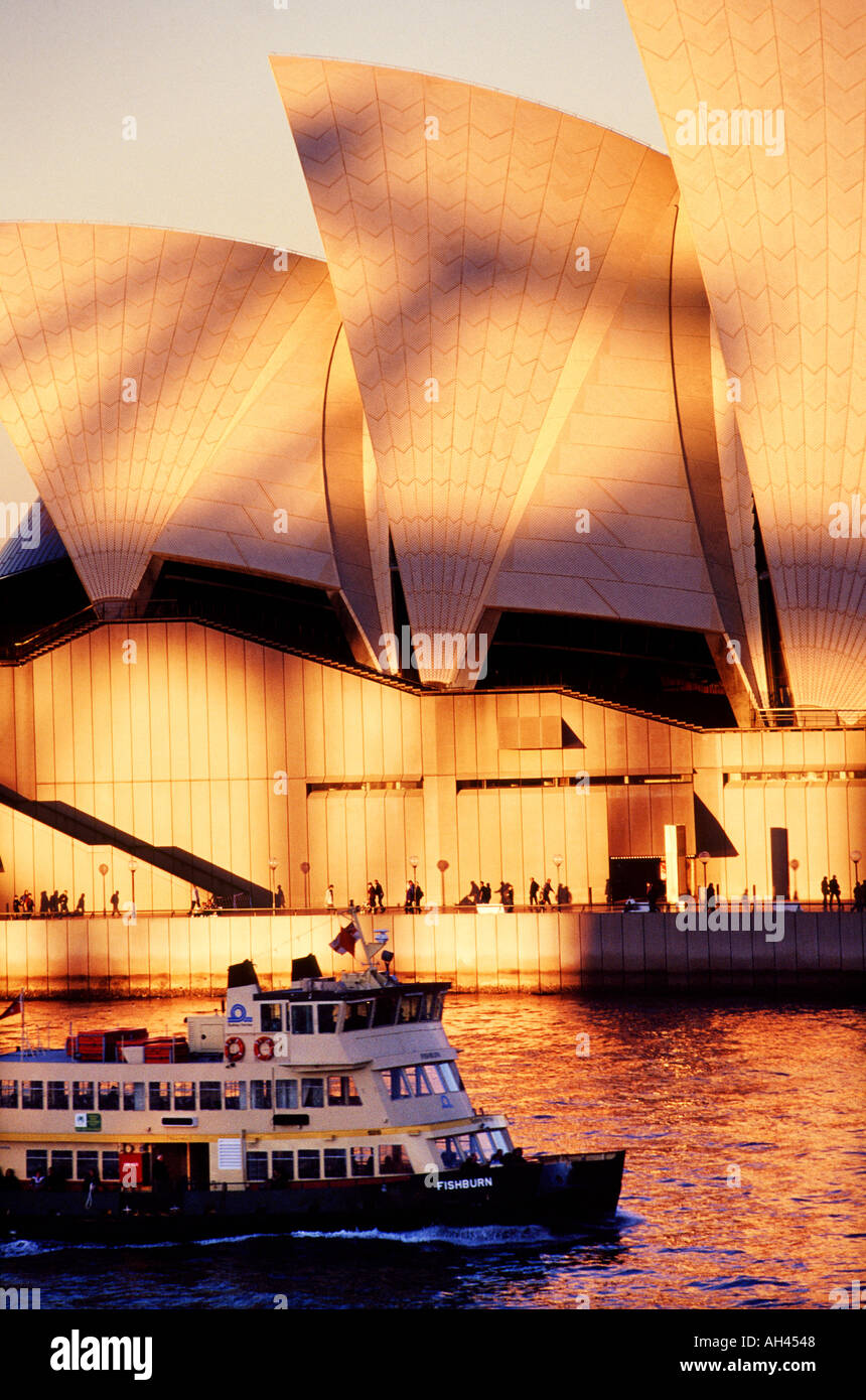 Famous landmark Sydney Opera House with a harbour ferry in the ...