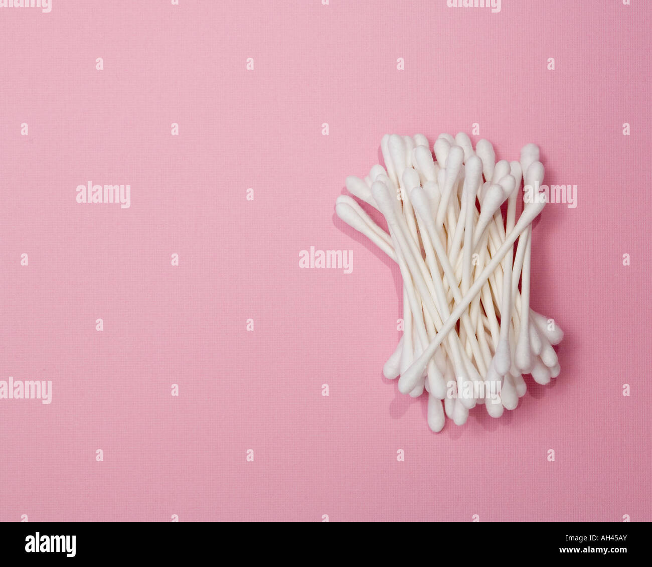 Cotton Swabs On Pink Surface Stock Photo - Alamy