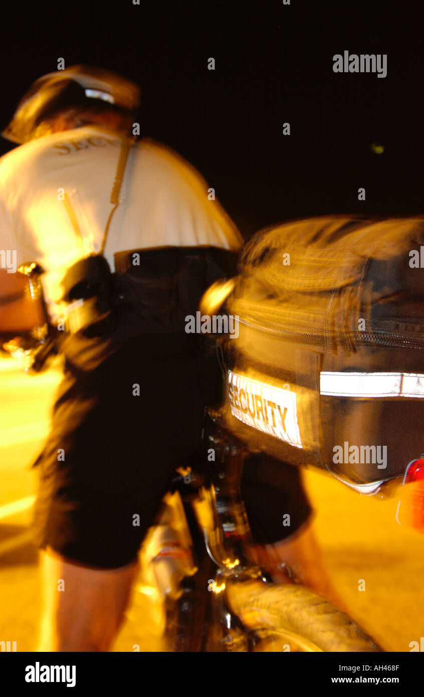 Security guard on bicycle Stock Photo - Alamy