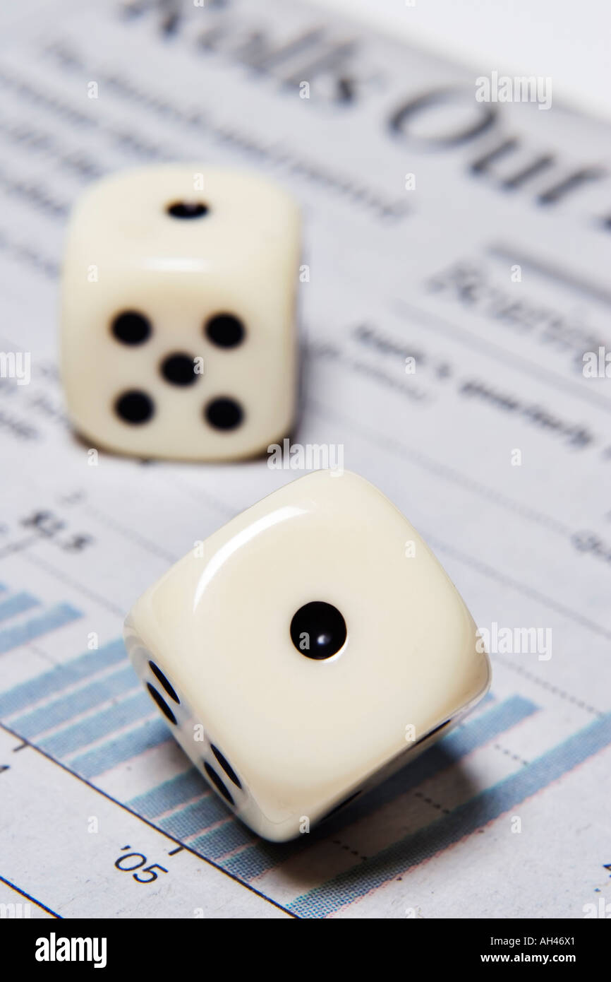 Dice on a graph from a stock report Stock Photo - Alamy