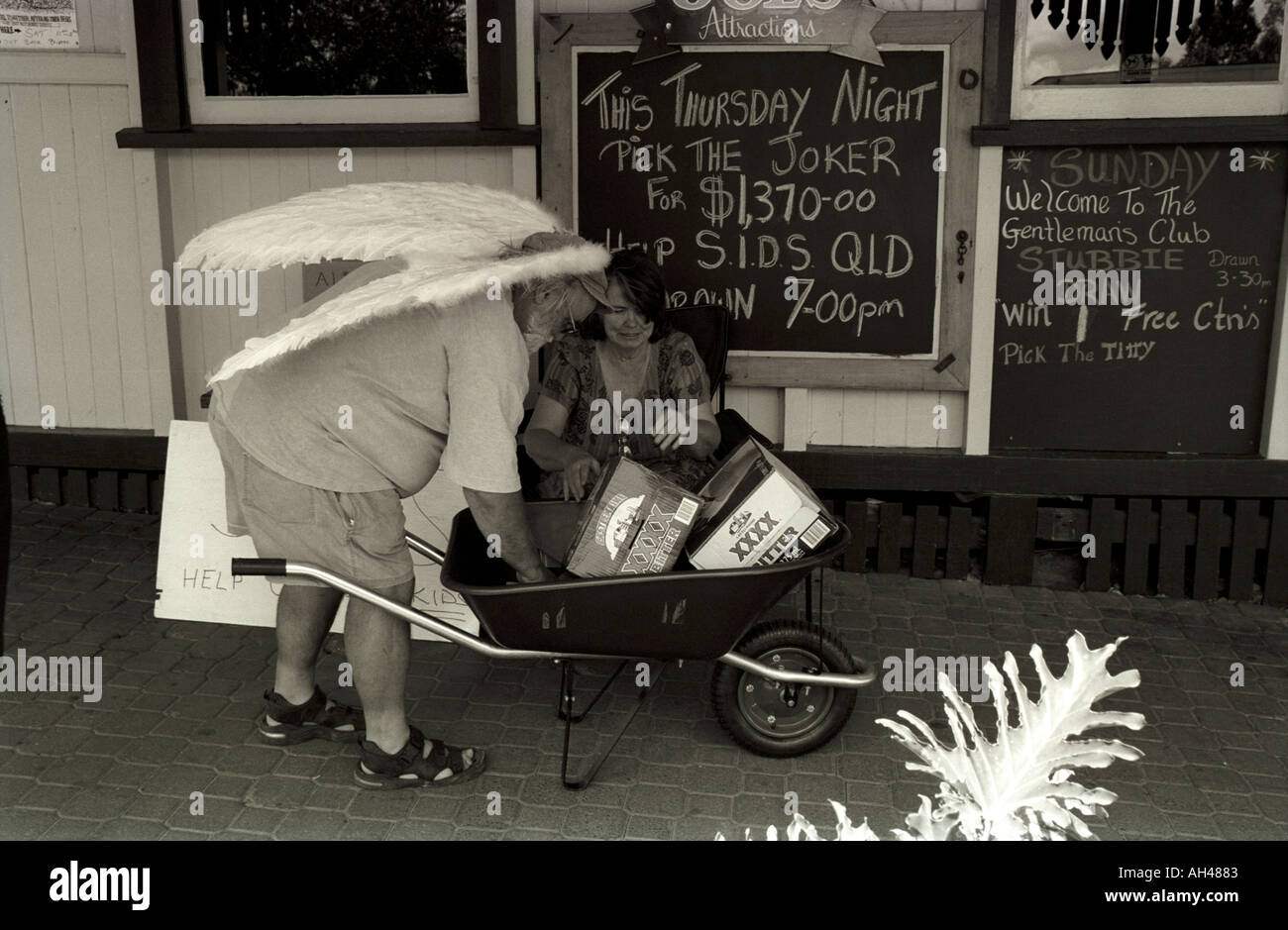 series angel raffle ticket seller eumundi markets 2079 Stock Photo - Alamy