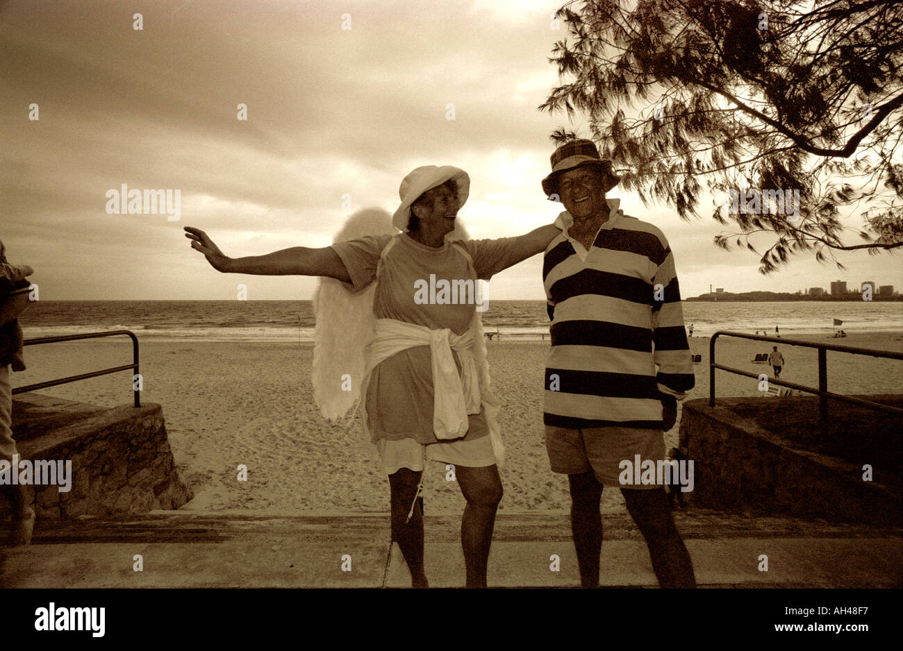 series angel woman and husband cavorting near beach 2068 Stock Photo ...