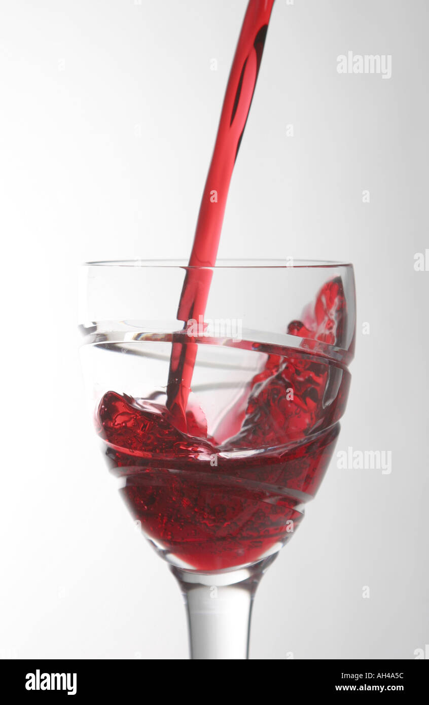 pouring red wine Stock Photo - Alamy