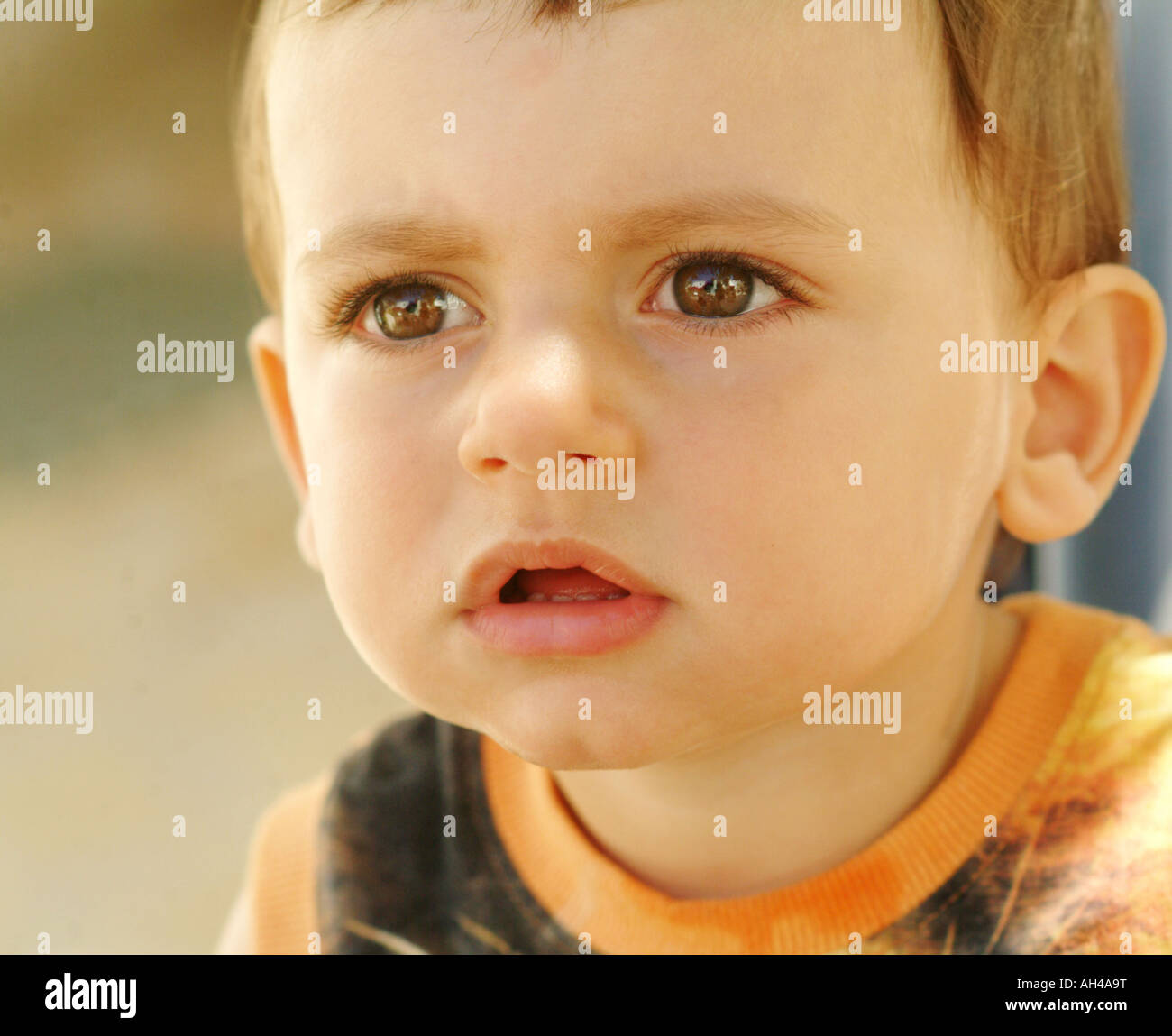 Baby with an intense look hi-res stock photography and images - Alamy