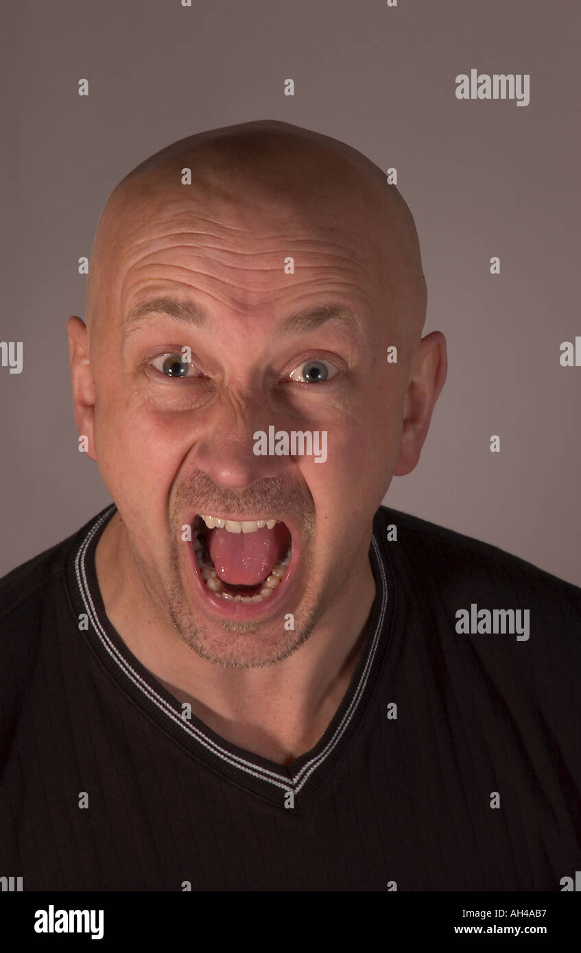 aggressive man expressing feelings Stock Photo - Alamy