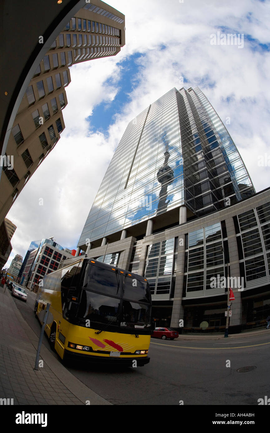 Bus on a downtown street Stock Photo - Alamy