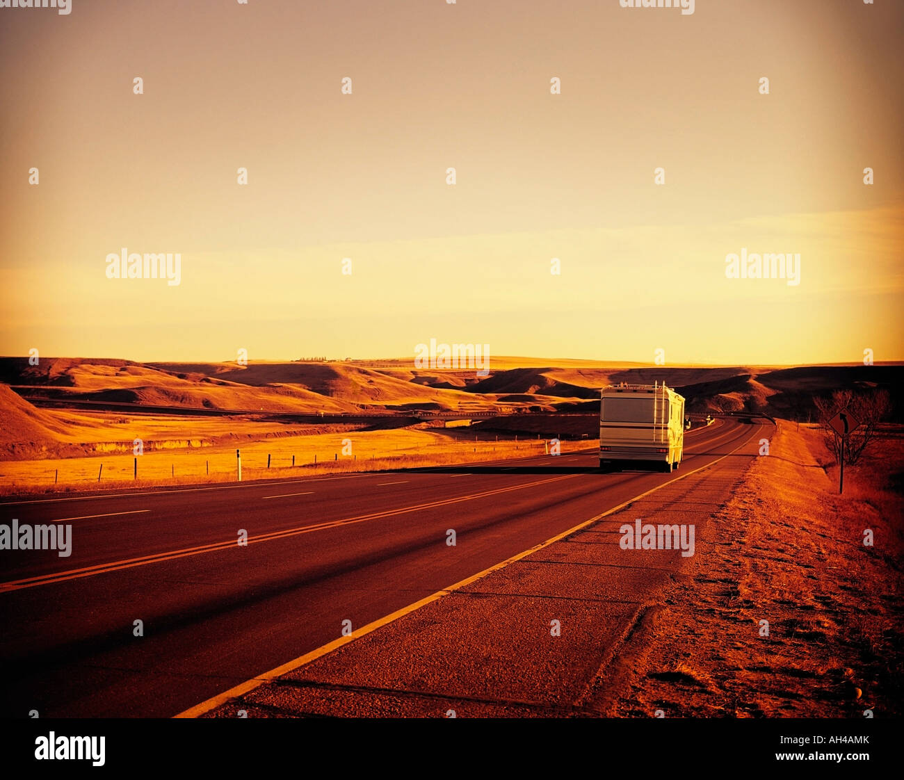 A recreational vehicle travelling down a hiway Stock Photo - Alamy