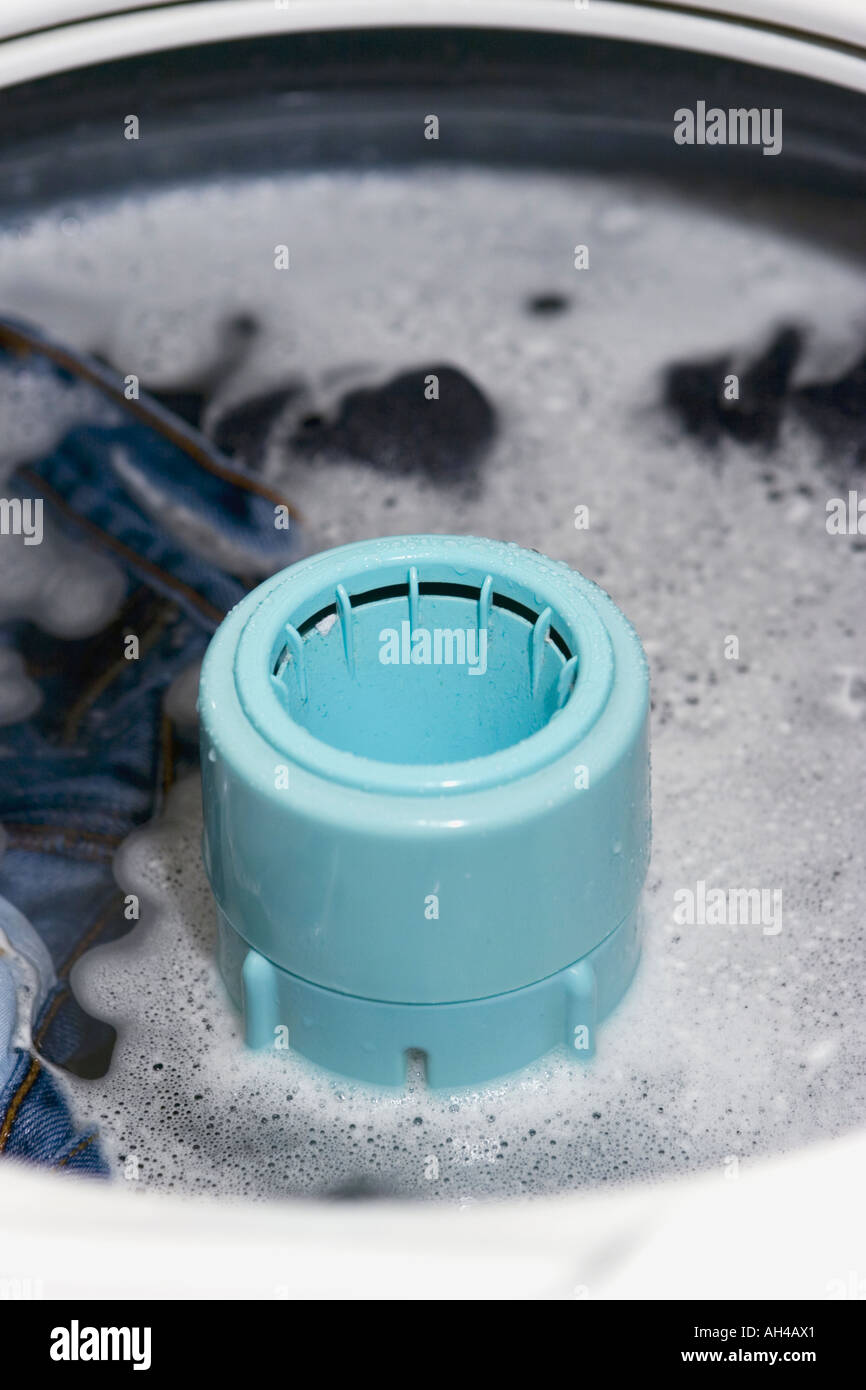 laundry machine washing dark clothes Stock Photo - Alamy