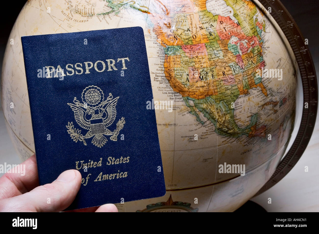 Passport and antique earth globe Stock Photo - Alamy Passport and antique earth globe Stock Photo - Alamy
