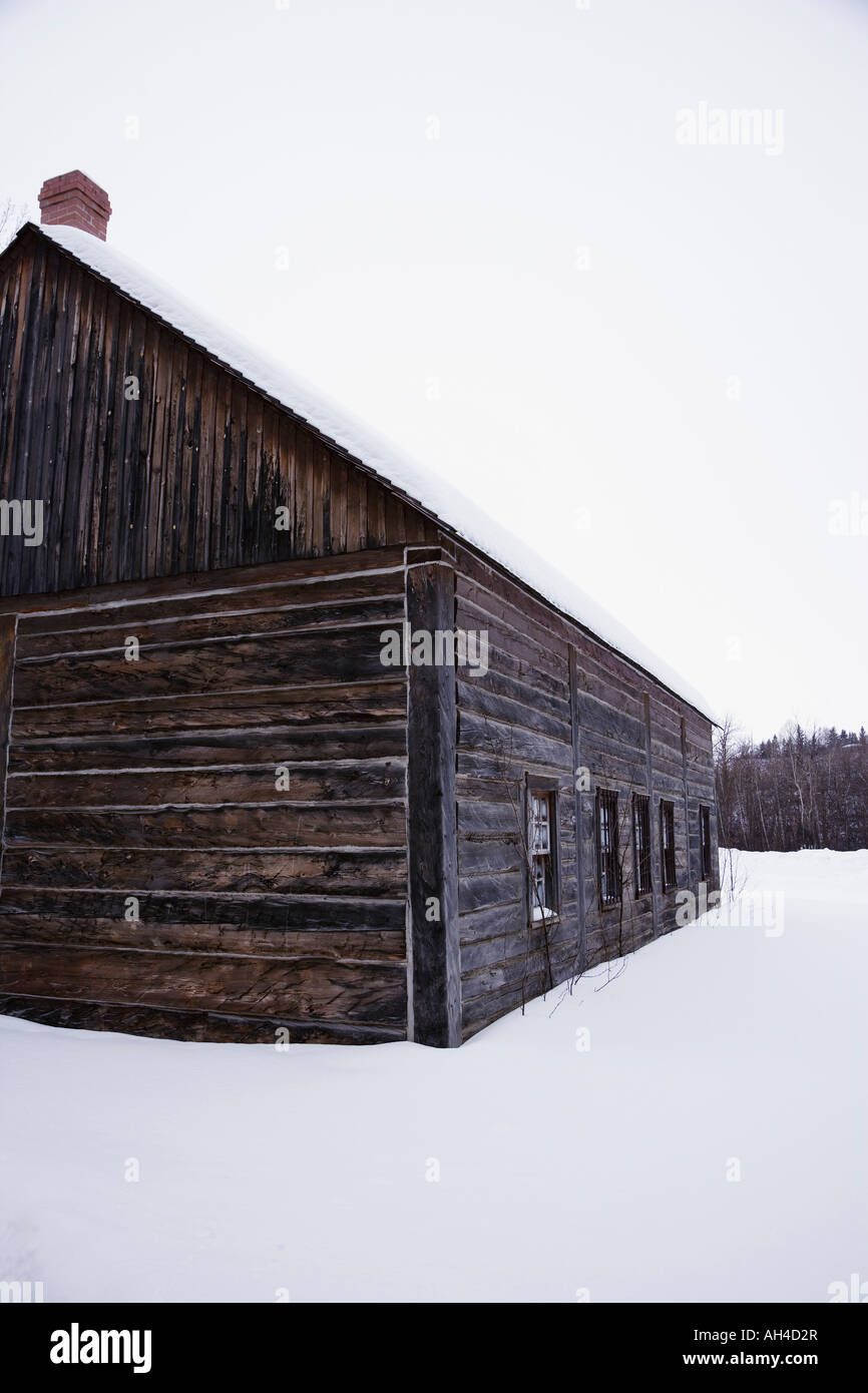 Wooden building in snow Stock Photo - Alamy