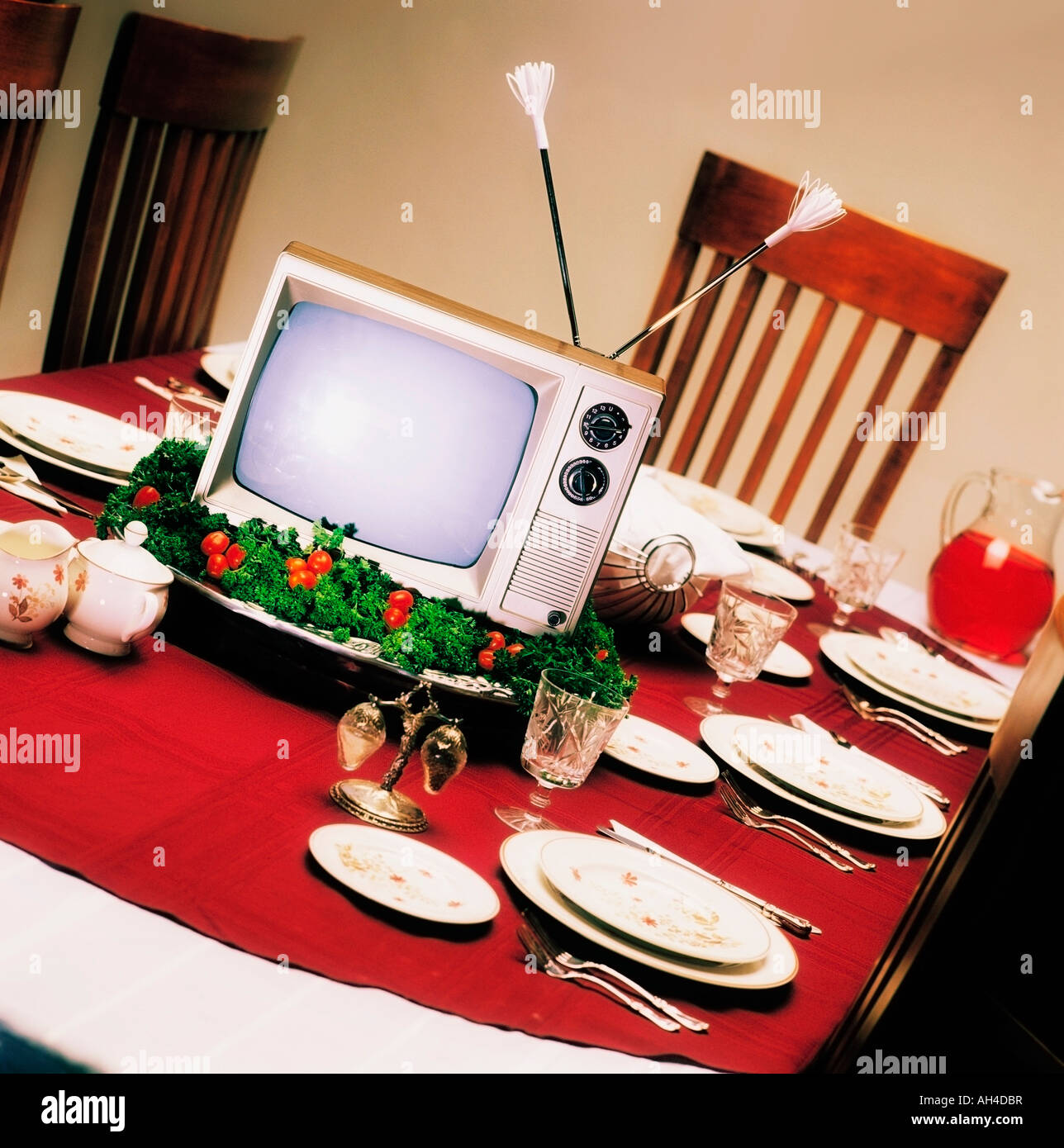 TV on platter on dinner table Stock Photo - Alamy