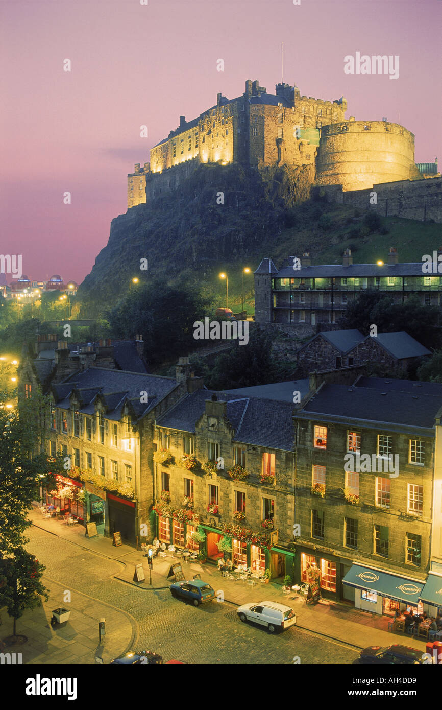 Edinburgh Castle above pubs at Grassmarket at dusk Stock Photo - Alamy
