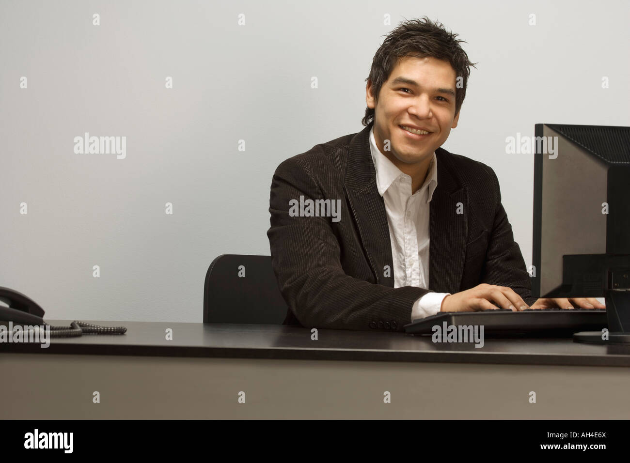 Man businessman computer workstation hi-res stock photography and ...