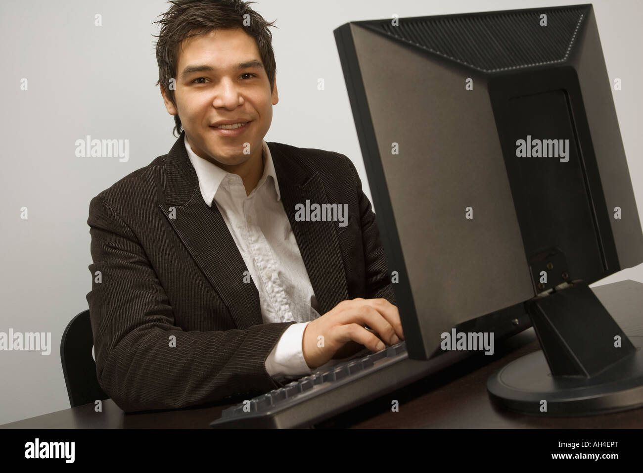 Businessman at computer Stock Photo - Alamy