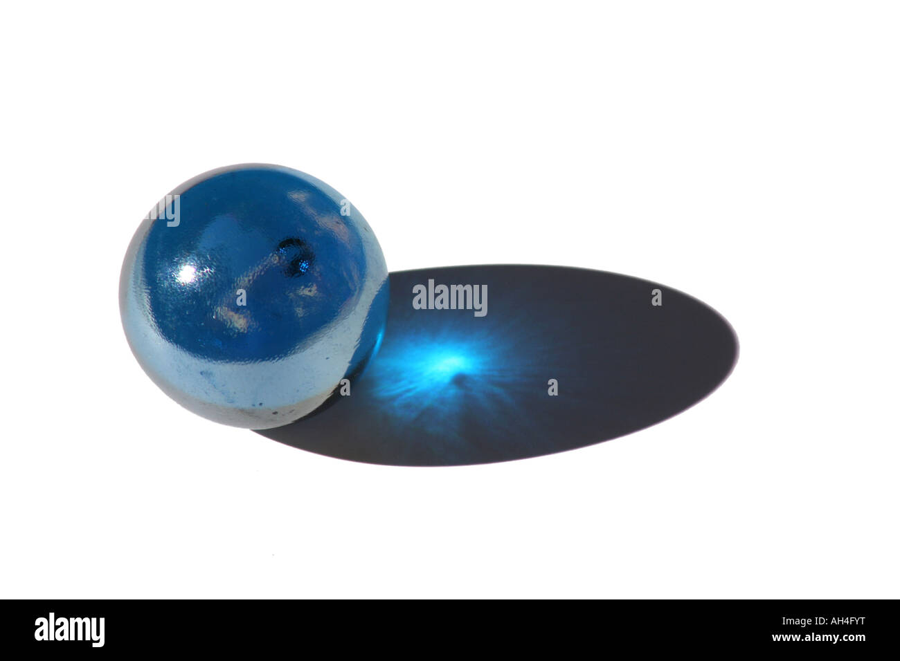 Translucent blue marble casting shadow on white background Stock Photo ...