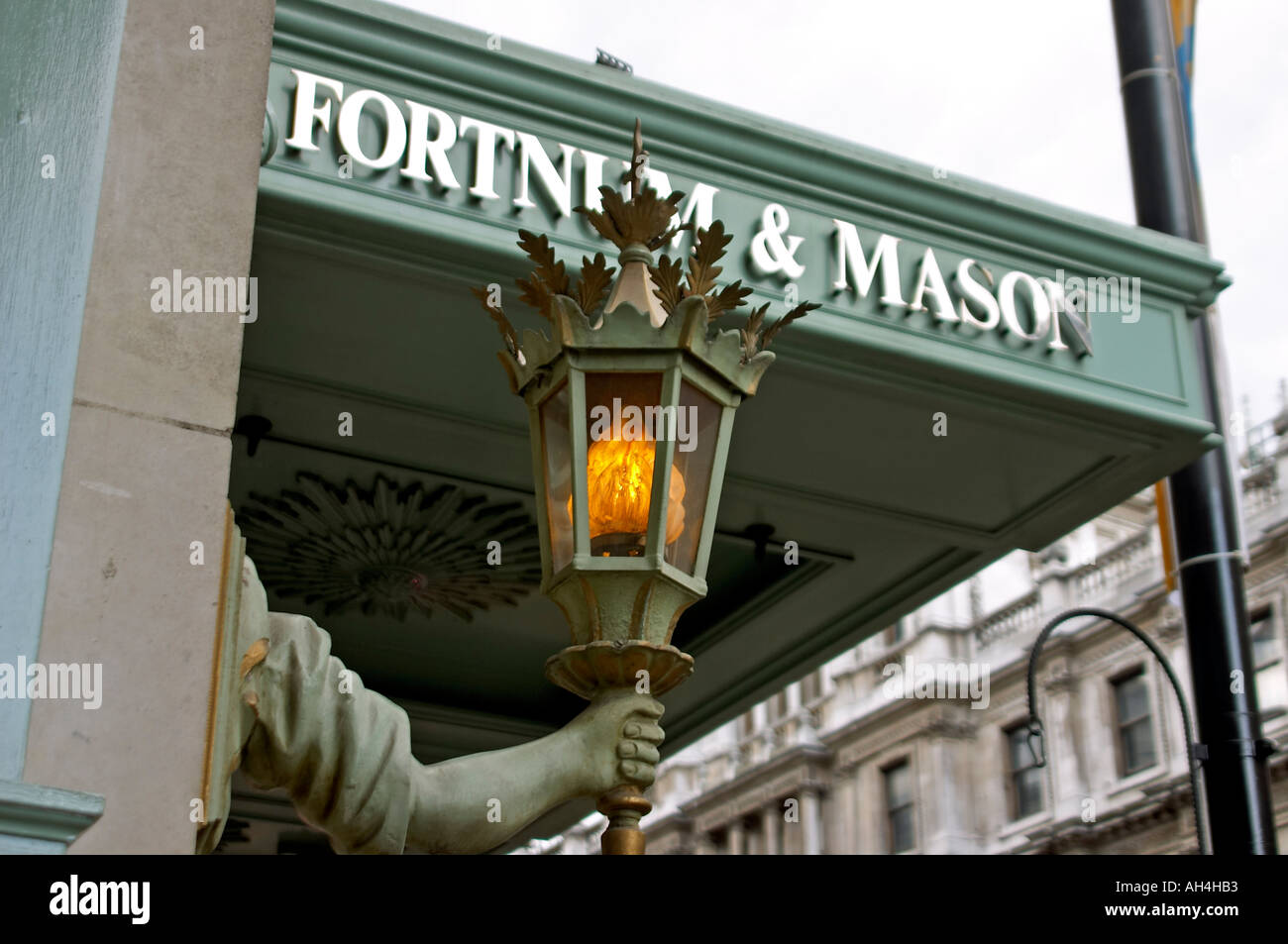 Fortnum and Mason shop store logo name sign with arm and lantern ...